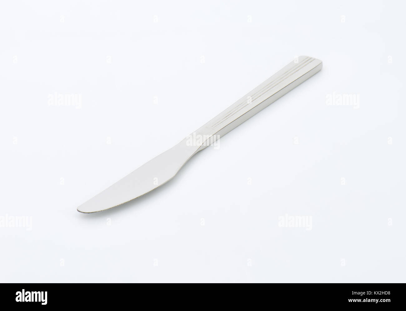 One table knife on white background Stock Photo - Alamy