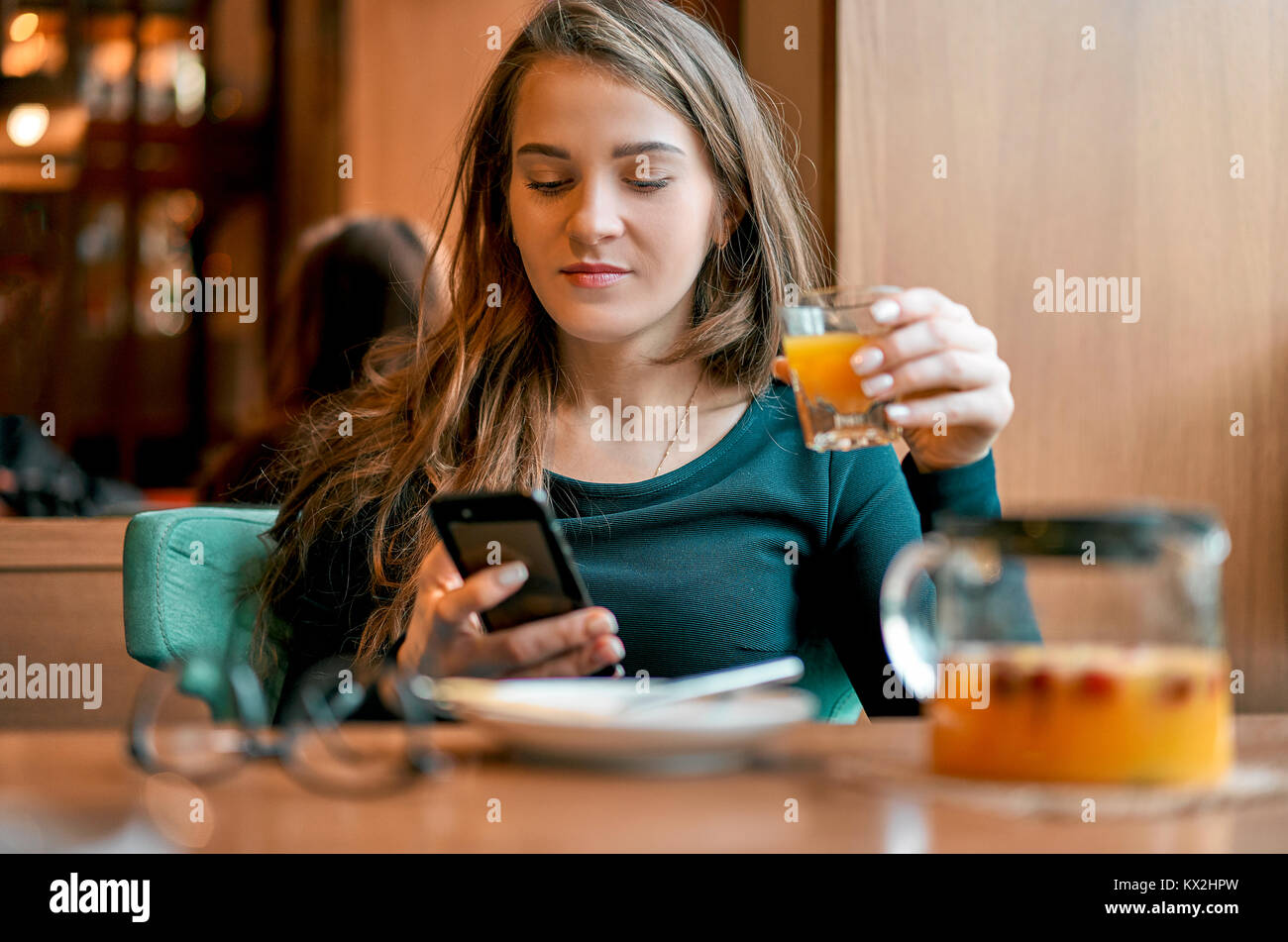 girl pours tea in a cafe Stock Photo - Alamy