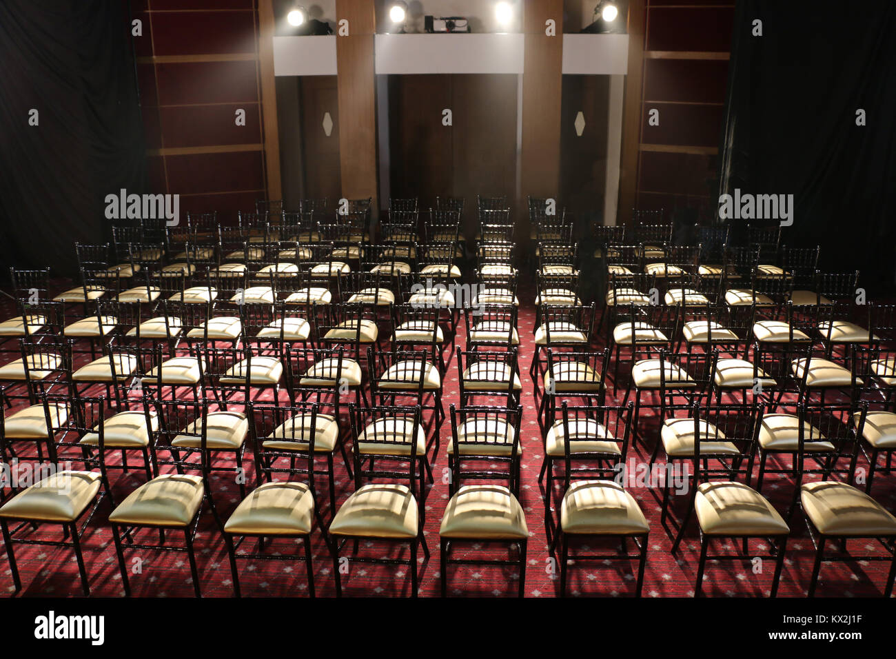 a lot of chairs put in a row in small auditorium for school play Stock ...
