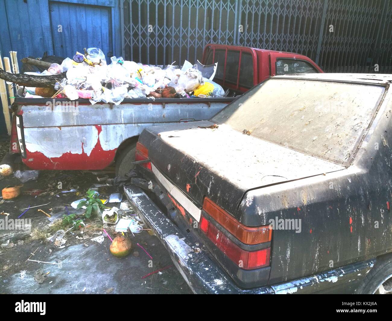The Garbage in a car on a street Stock Photo - Alamy