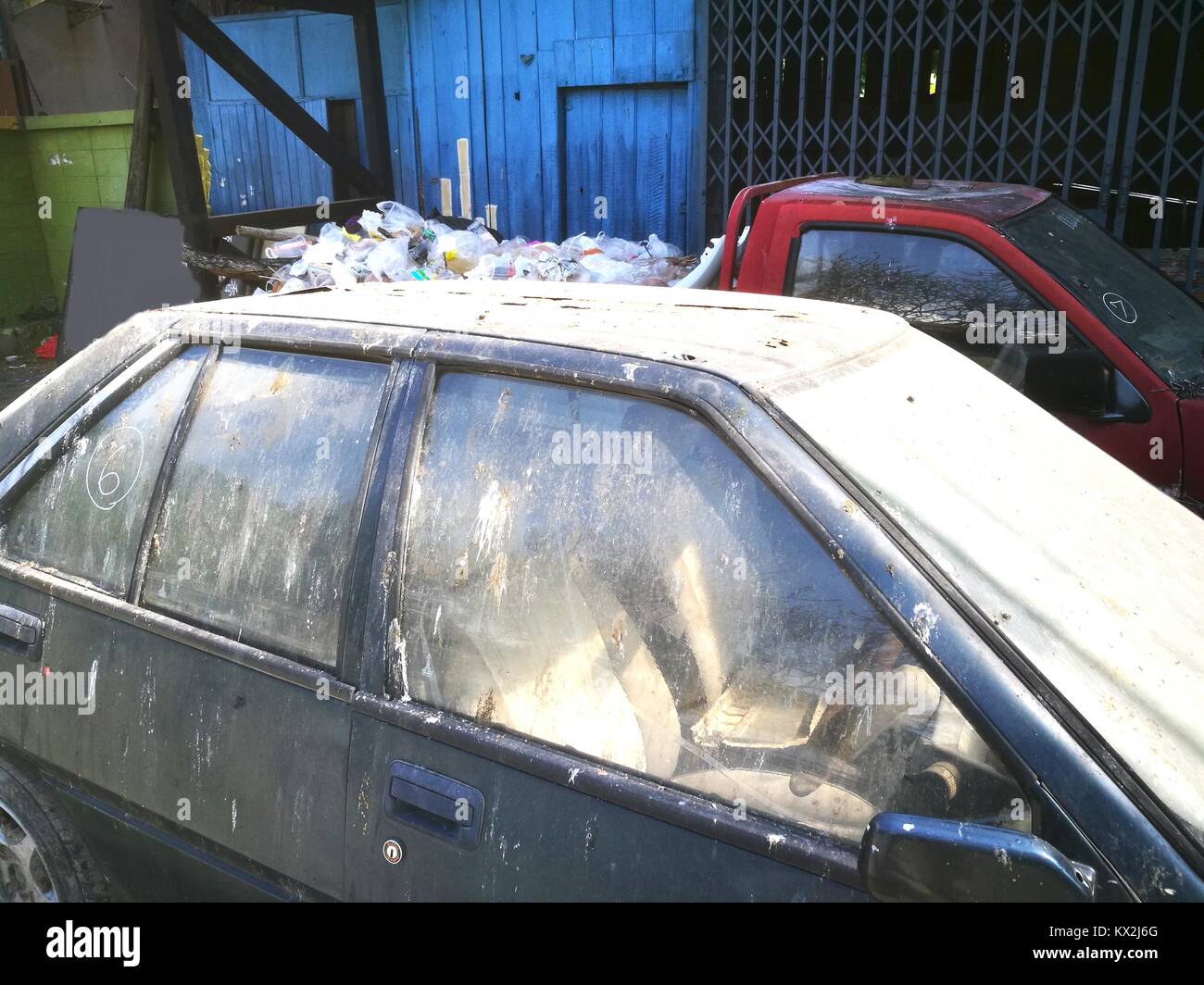 The Garbage in a car on a street Stock Photo - Alamy