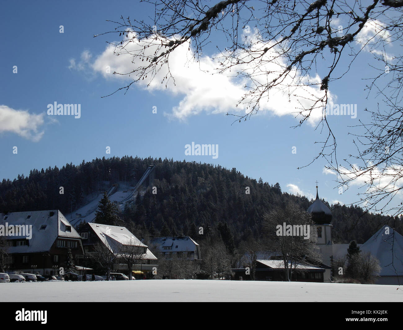 View of church and ski jumping stadium in Hinterzarten, Germany Stock ...