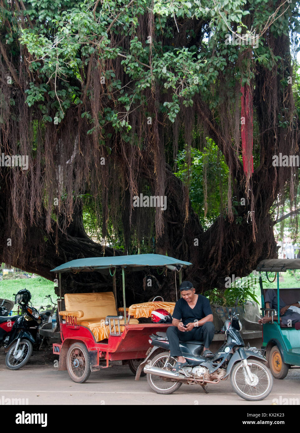 Motorised Rickshaw Driver Stock Photo - Alamy