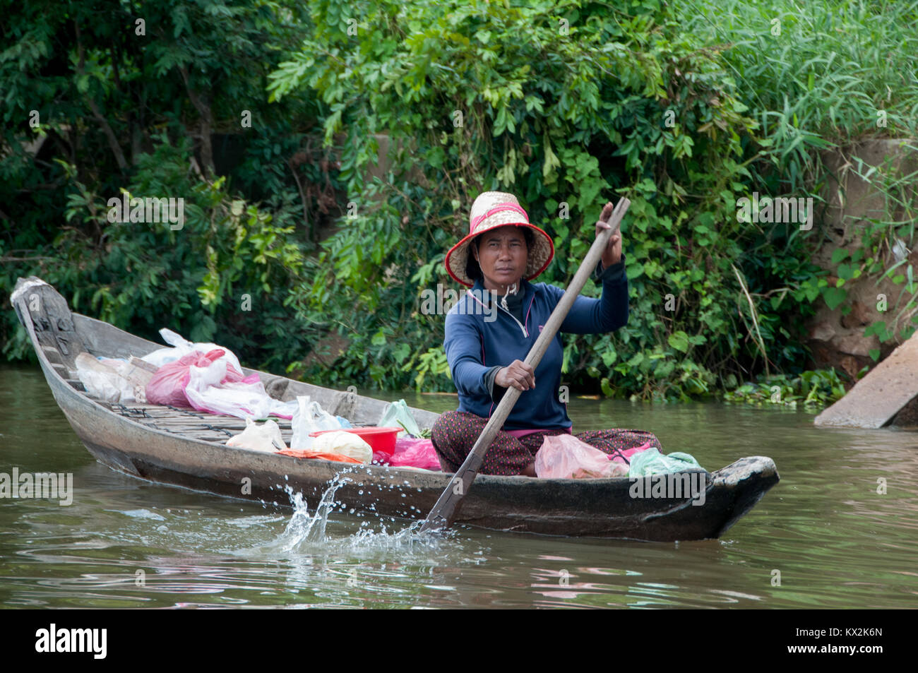 Old Cambodian Lady on Fishing Boat Stock Photo - Alamy