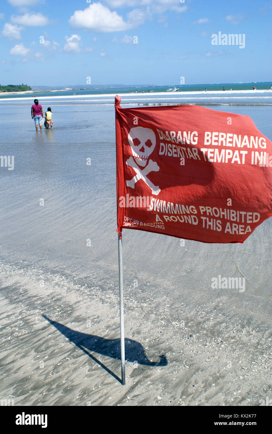 Red flag in Kuta on the beach, Bali, Indonesia Stock Photo - Alamy