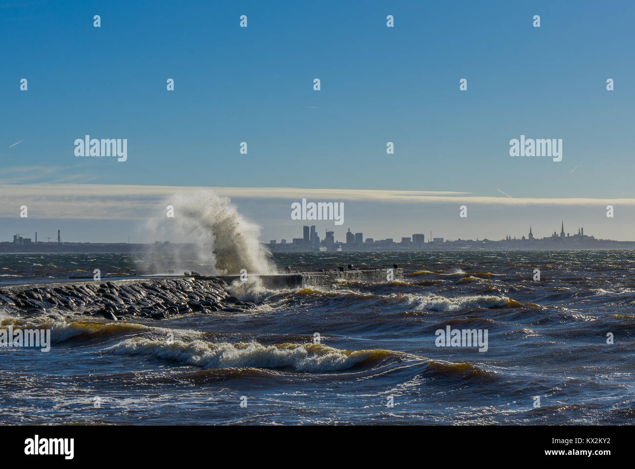 Storm on sea. Estonian capital Tallinn at background Stock Photo - Alamy