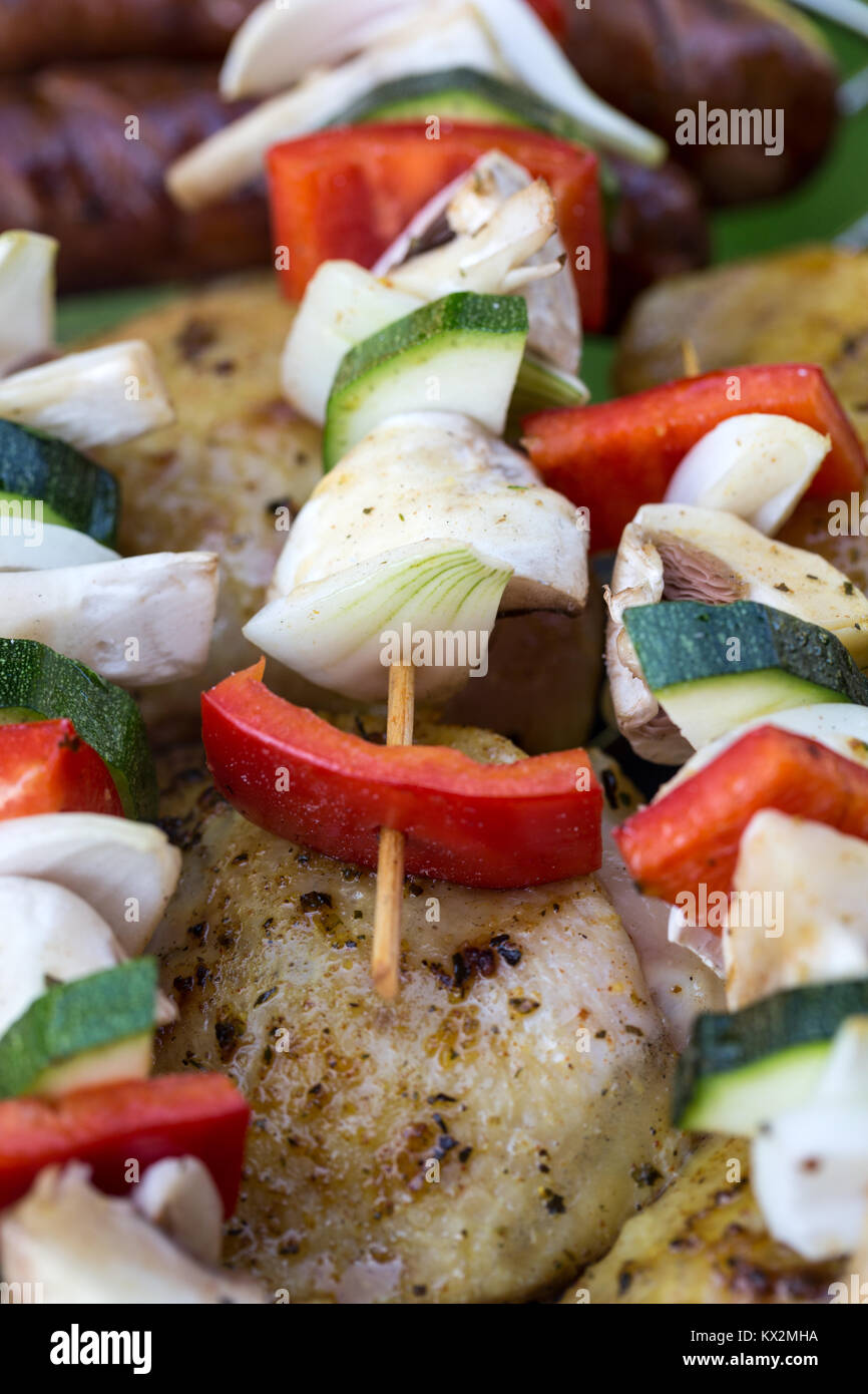 barbecue with delicious grilled meat and vegetables on grill Stock ...