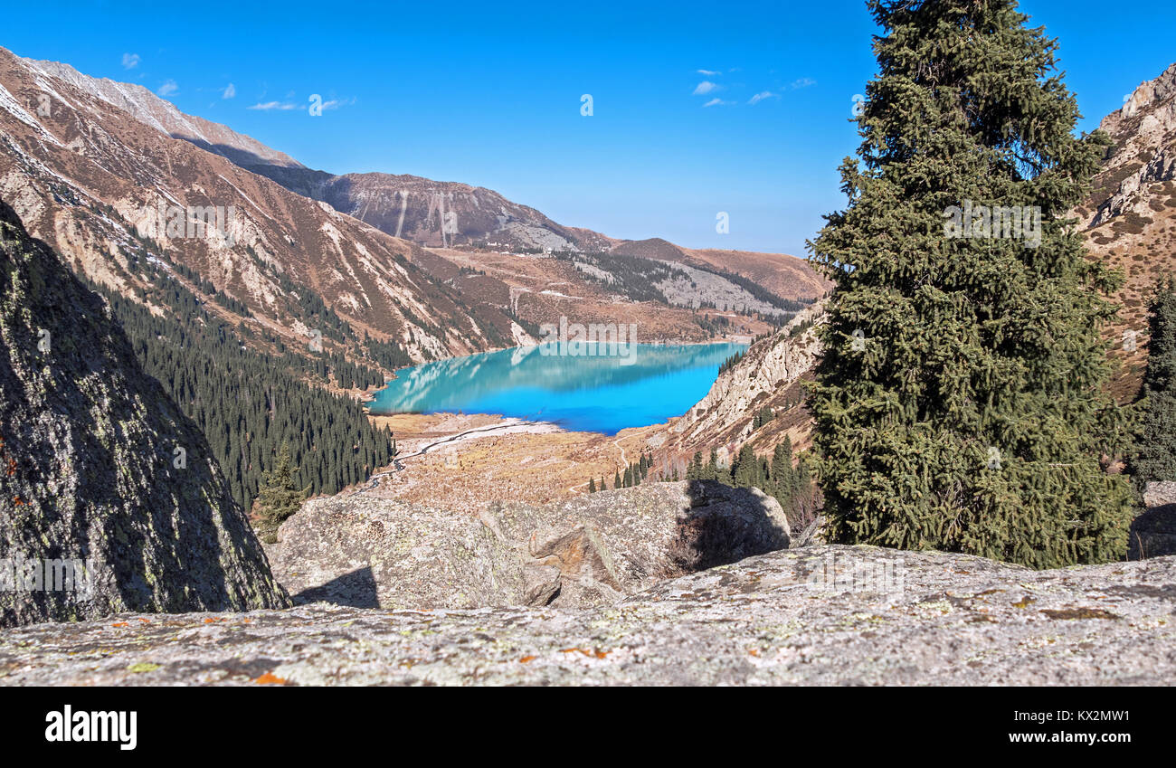 Magical view of the emerald Big Almaty lake in autumn season Stock ...