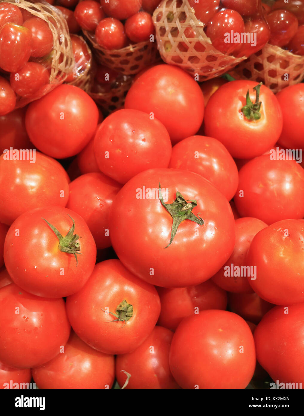 Pile of Vibrant Red Ripe Tomatoes, Vertical Picture Stock Photo - Alamy