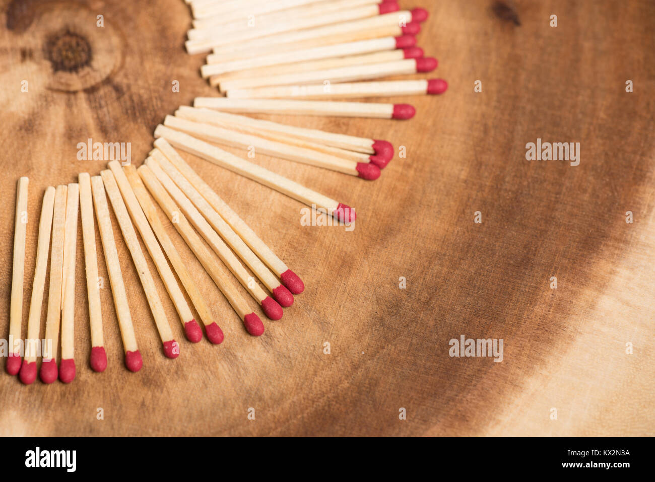 Matches on wooden table background with copy space Stock Photo - Alamy