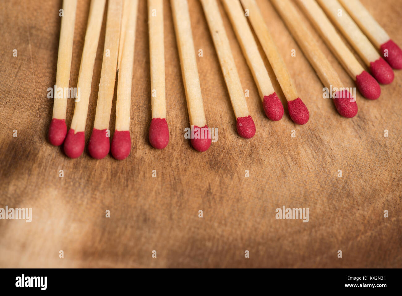 Matches on wooden table background with copy space Stock Photo - Alamy