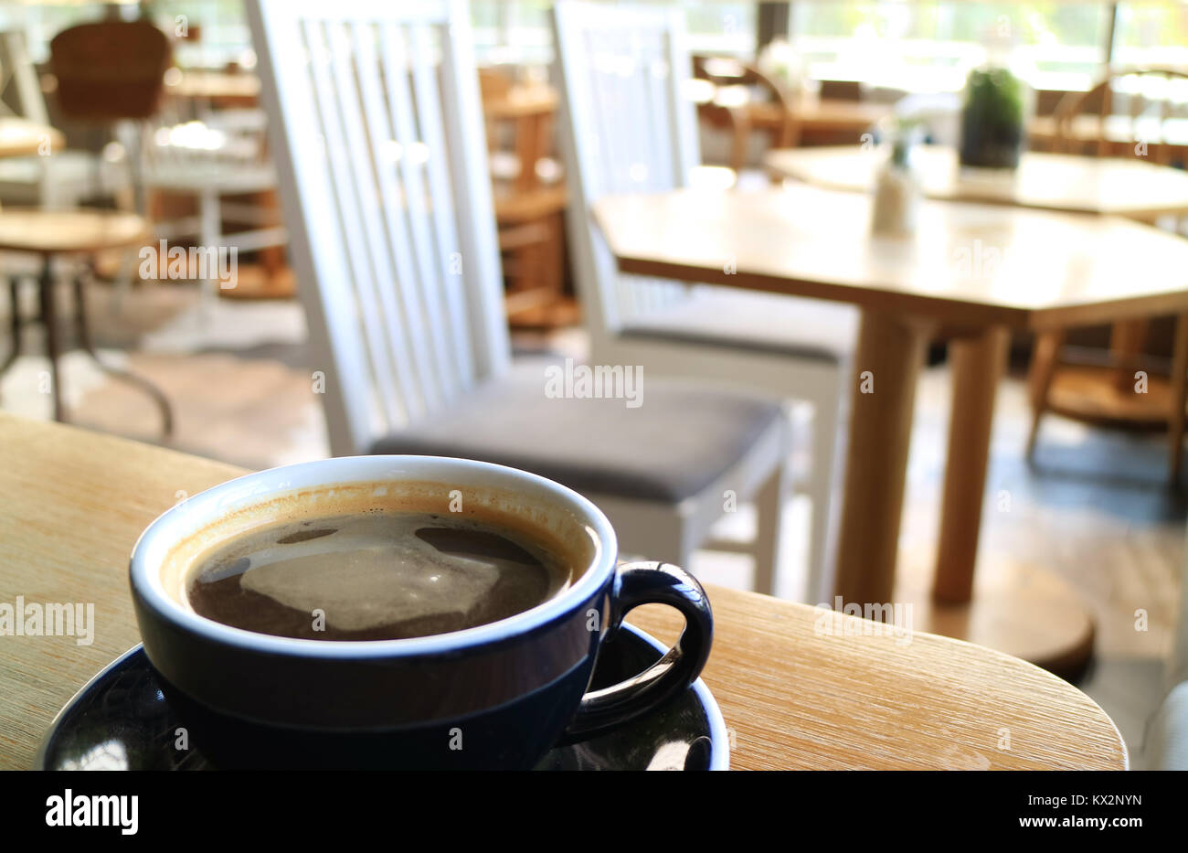 Sipping a cup of coffee at a relaxing space Stock Photo - Alamy