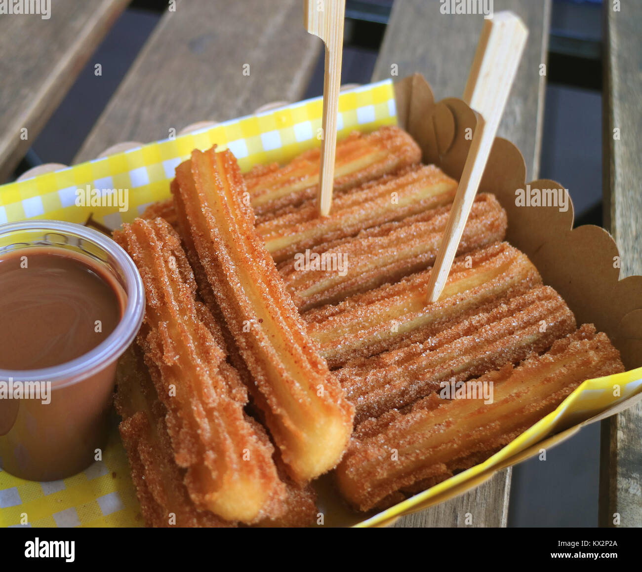 Spanish Cinnamon Churros with Chocolate Dipping Sauce Stock Photo - Alamy