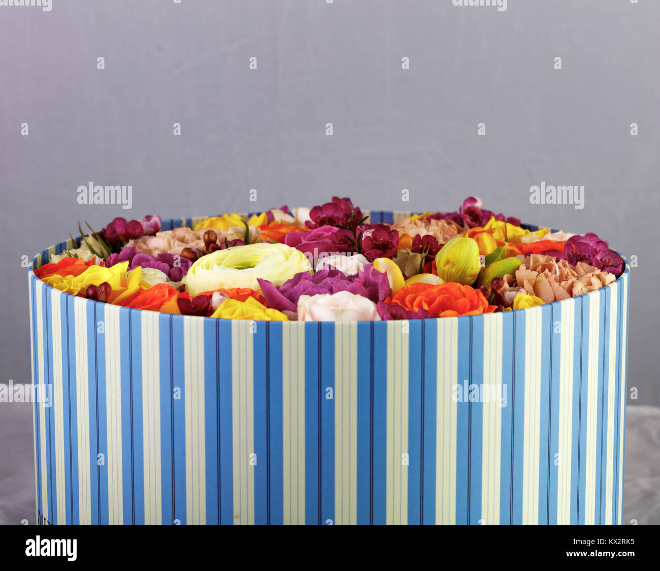 Flowers in a gift box Stock Photo - Alamy