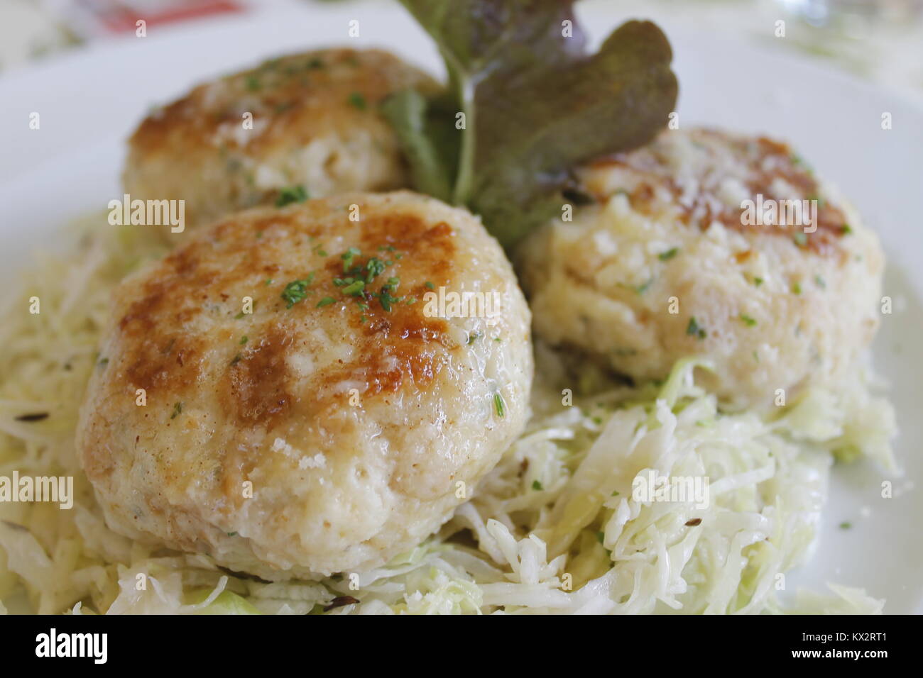 Tyrolean traditional dish, knodel or canederli with parsley Stock Photo ...