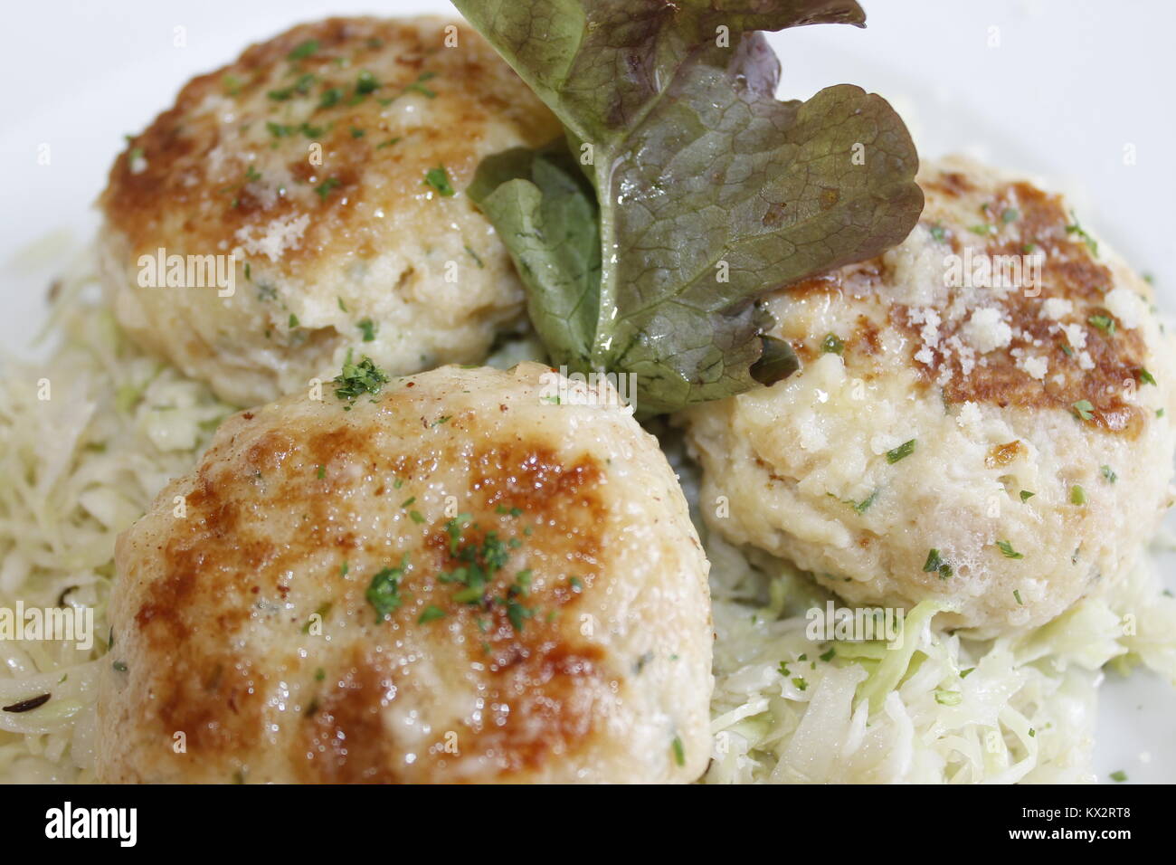 Tyrolean traditional dish, knodel or canederli with parsley Stock Photo ...