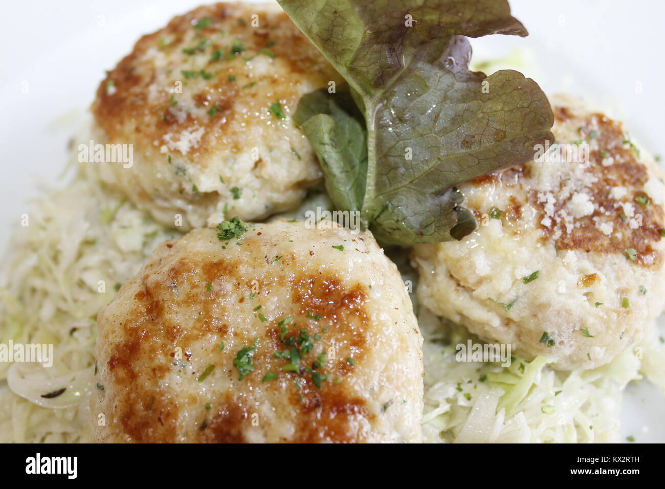Tyrolean traditional dish, knodel or canederli with parsley Stock Photo ...