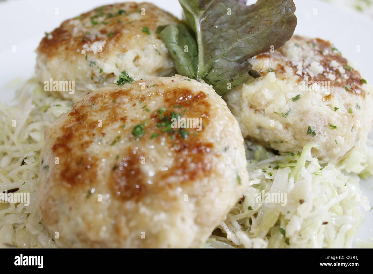 Tyrolean traditional dish, knodel or canederli with parsley Stock Photo ...