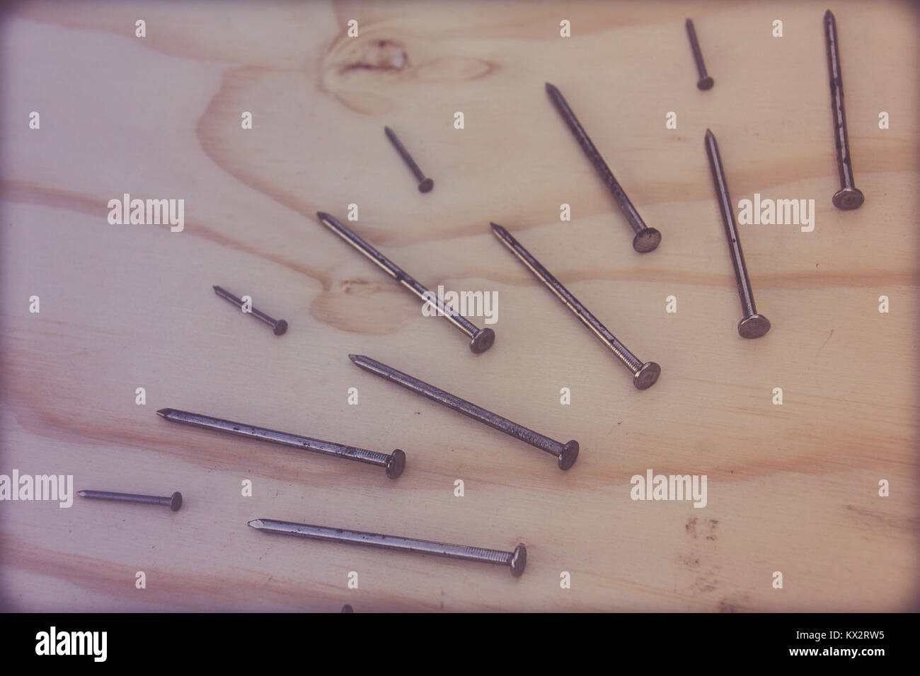 Photograph of some Metal nails in geometric composition Stock Photo - Alamy