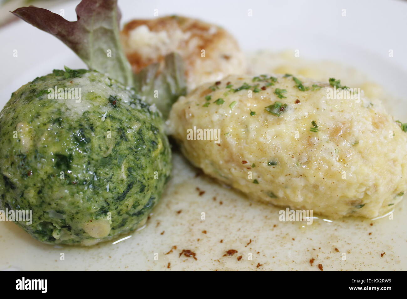 Tyrolean traditional dish, knodel or canederli with parsley Stock Photo ...
