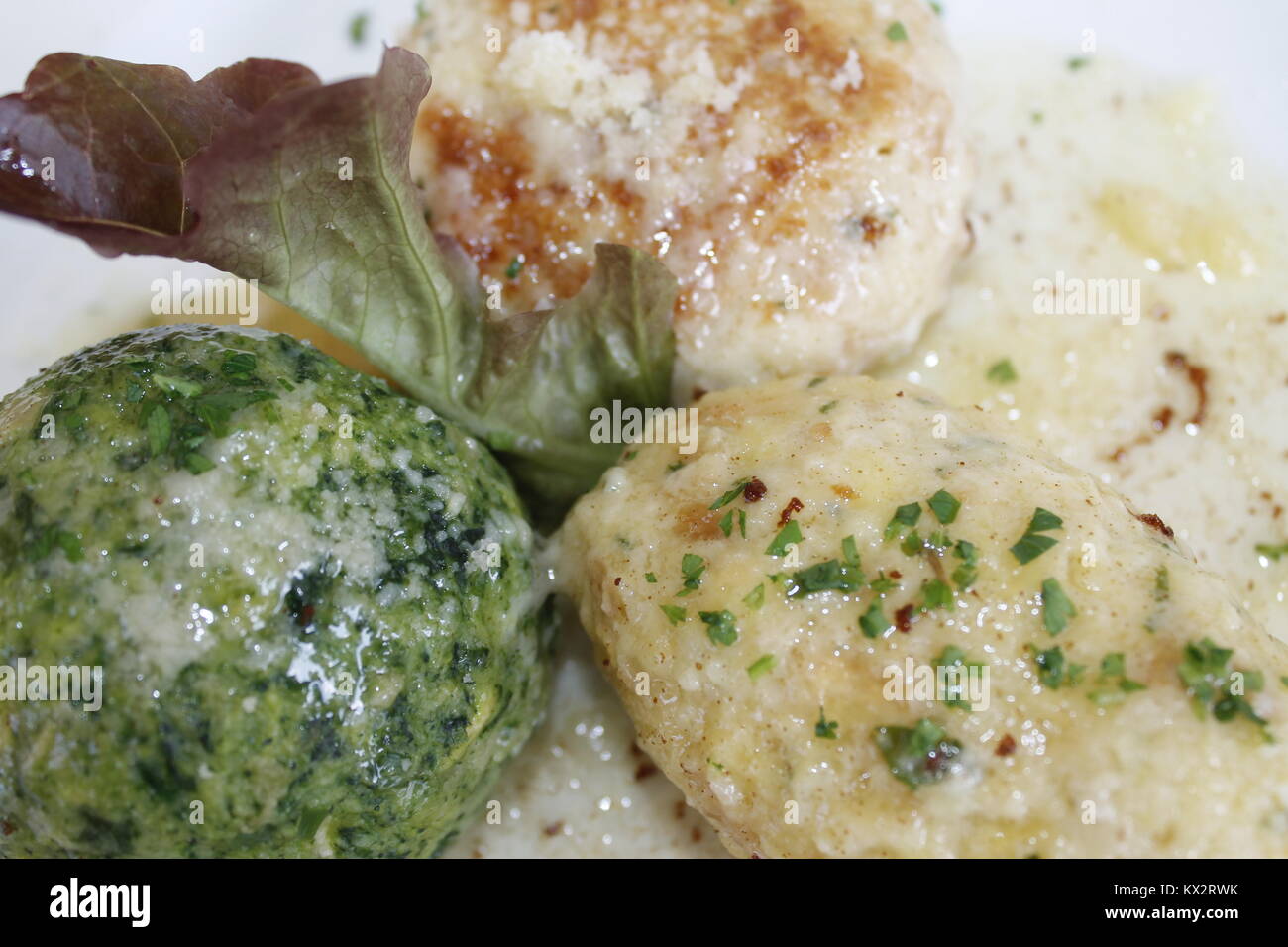 Tyrolean traditional dish, knodel or canederli with parsley Stock Photo ...