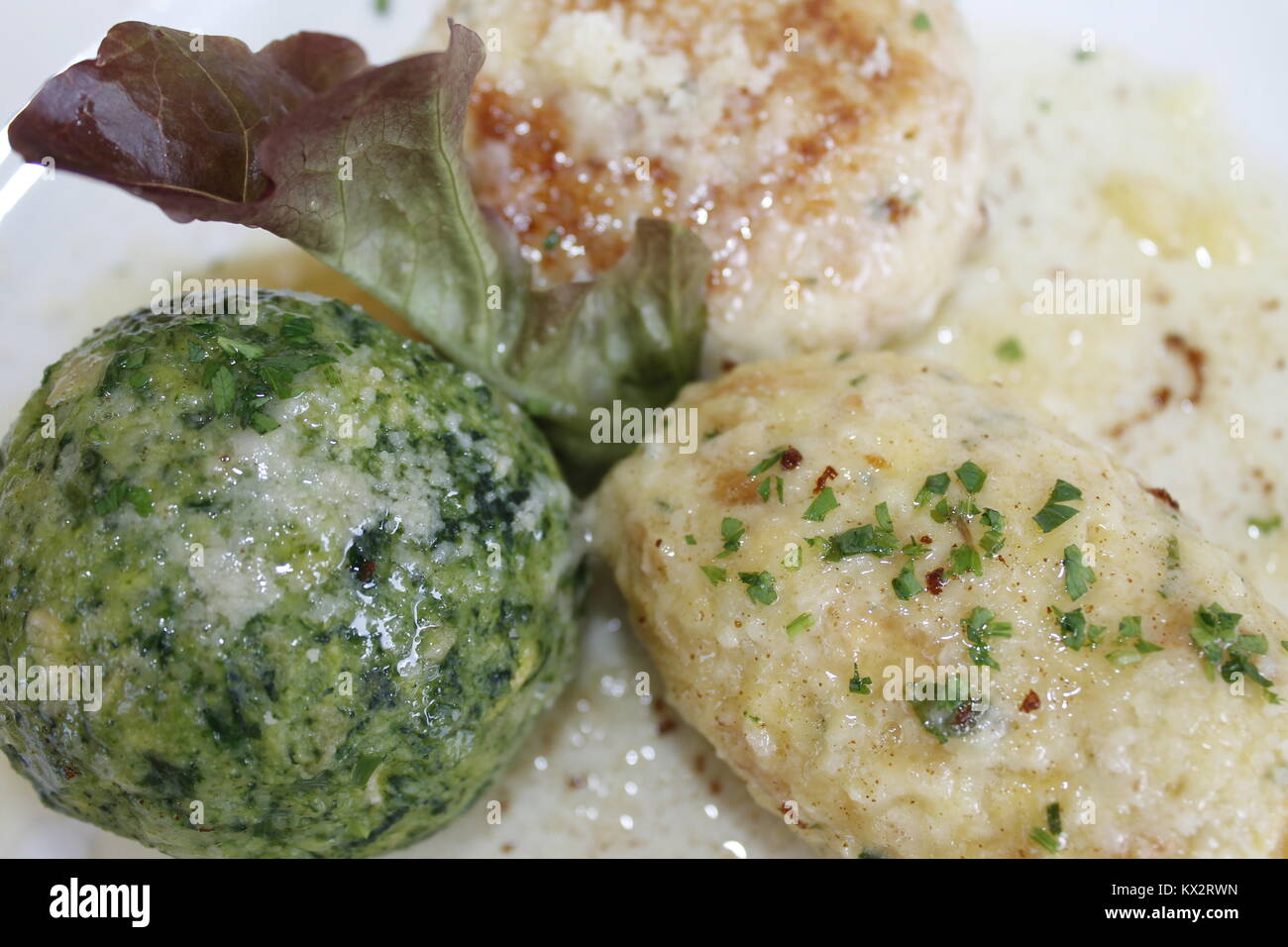 Tyrolean traditional dish, knodel or canederli with parsley Stock Photo ...
