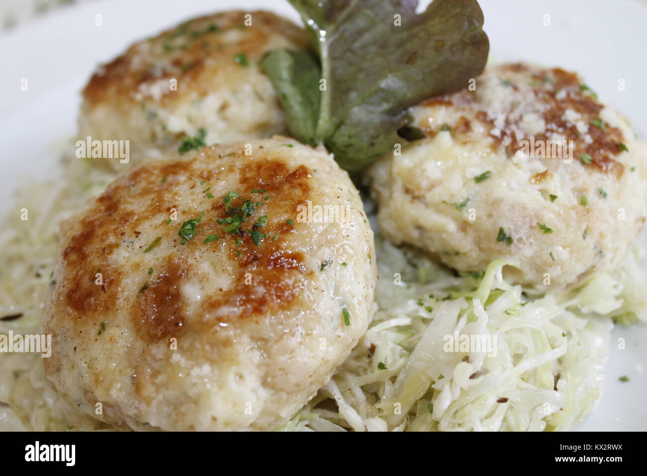 Tyrolean traditional dish, knodel or canederli with parsley Stock Photo ...