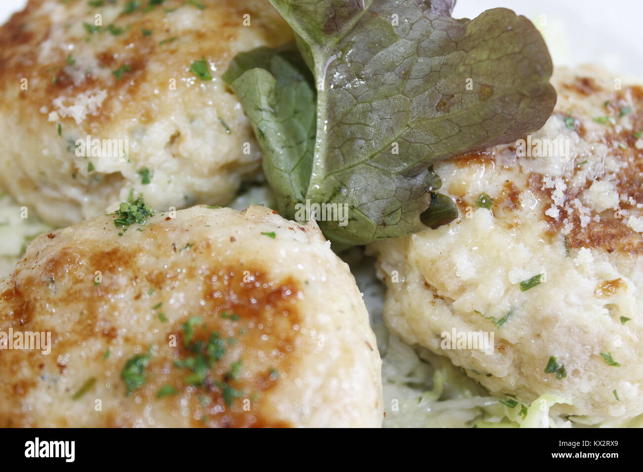 Tyrolean traditional dish, knodel or canederli with parsley Stock Photo ...