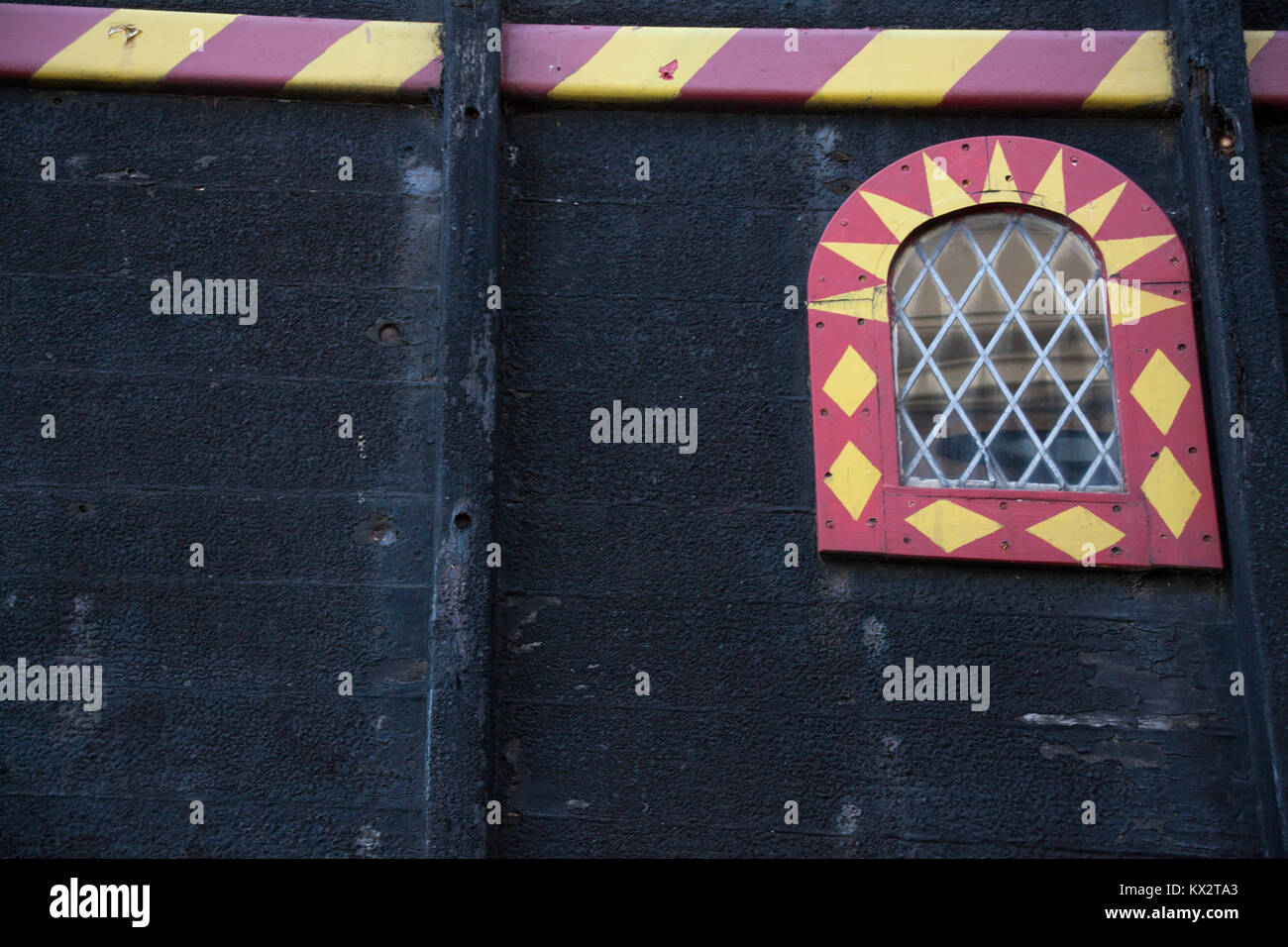 Close up of an old merchant ship without water in harbour in London ...