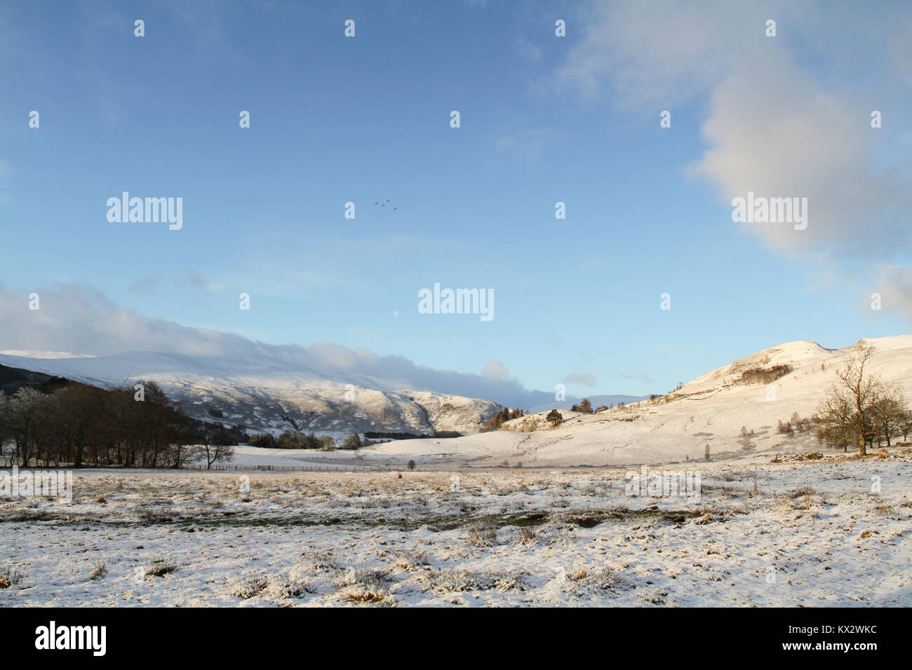 A winter landscape view of the dramatic mountains at Kinloch Rannoch ...