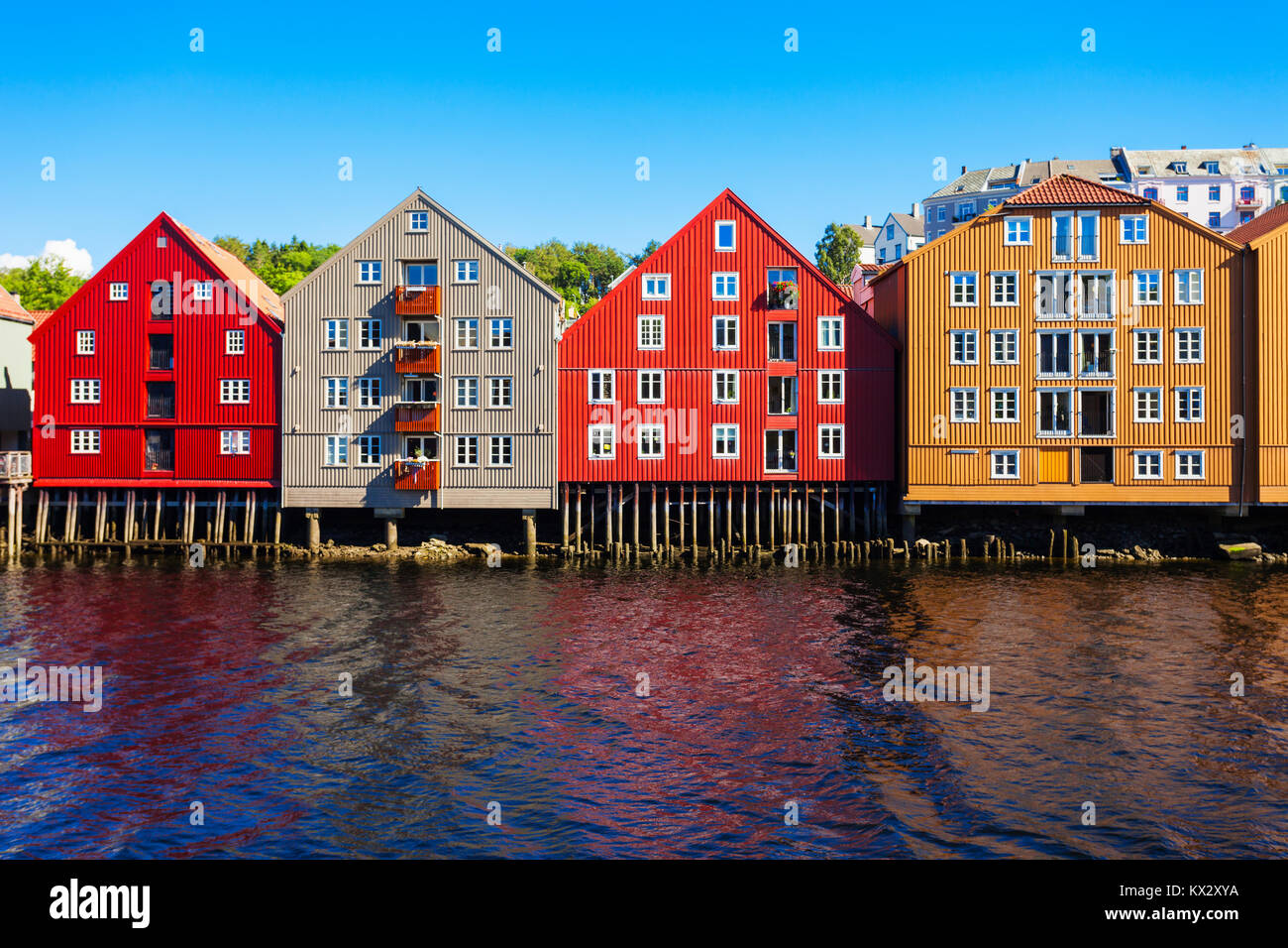 Colorful old houses at the Nidelva river embankment in the center of ...