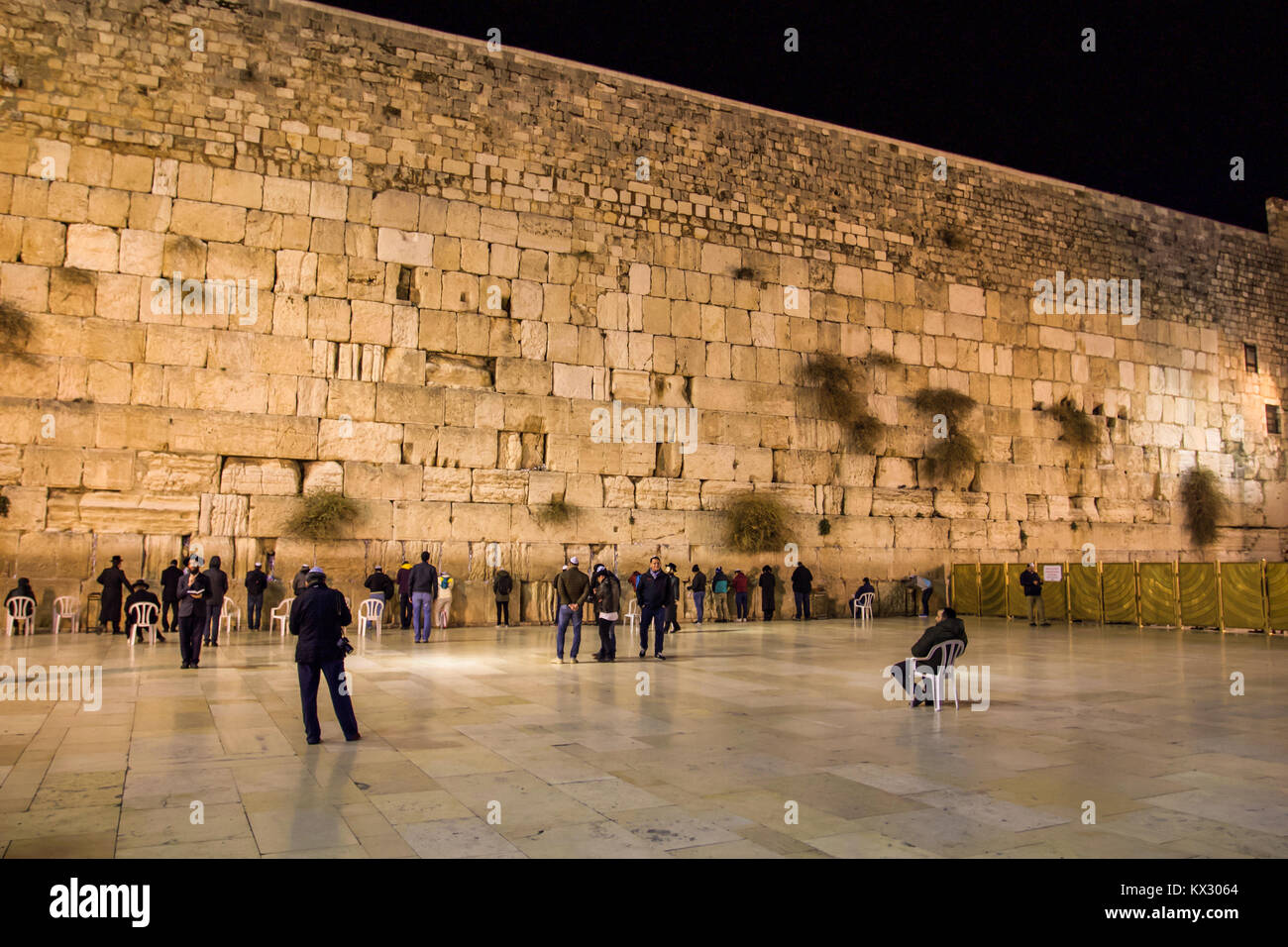 praying people at the western wall in the evening Jerusalem religion ...