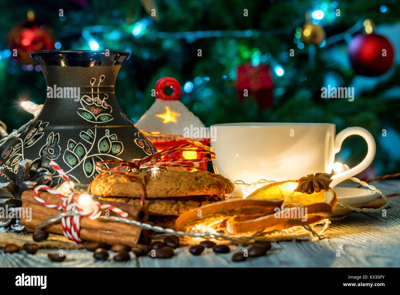 Cozy winter setting with cup of coffee and cezva Stock Photo - Alamy
