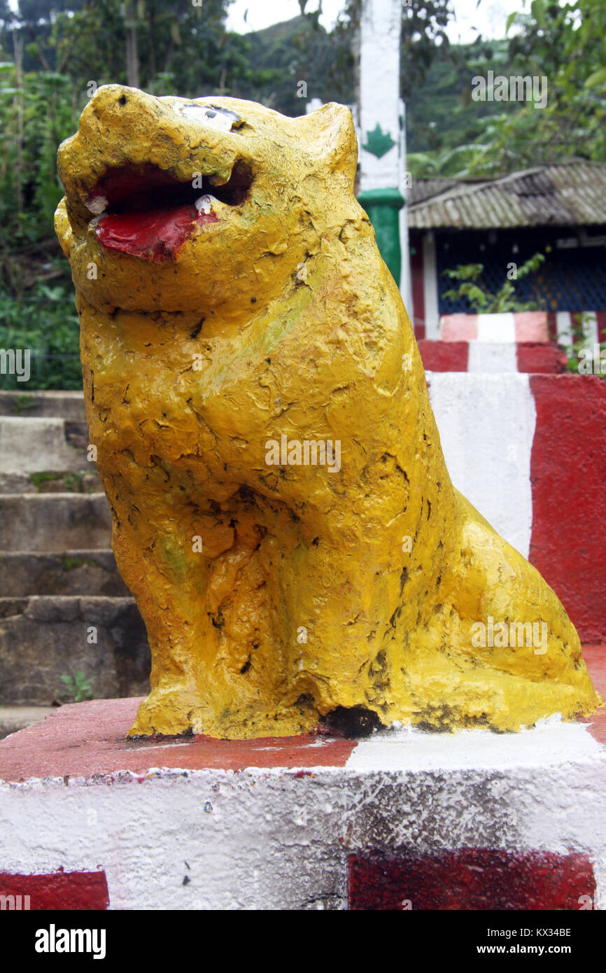 Yellow lion near hindu shrine in Sri Lanka Stock Photo - Alamy