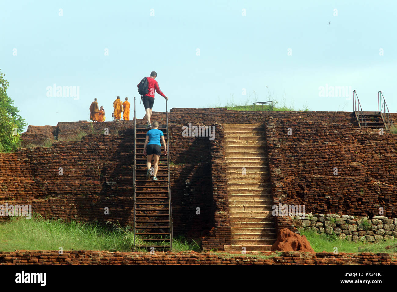 Monks nd tourists on the top of Sigiriya rock, Sri Lanka Stock Photo ...