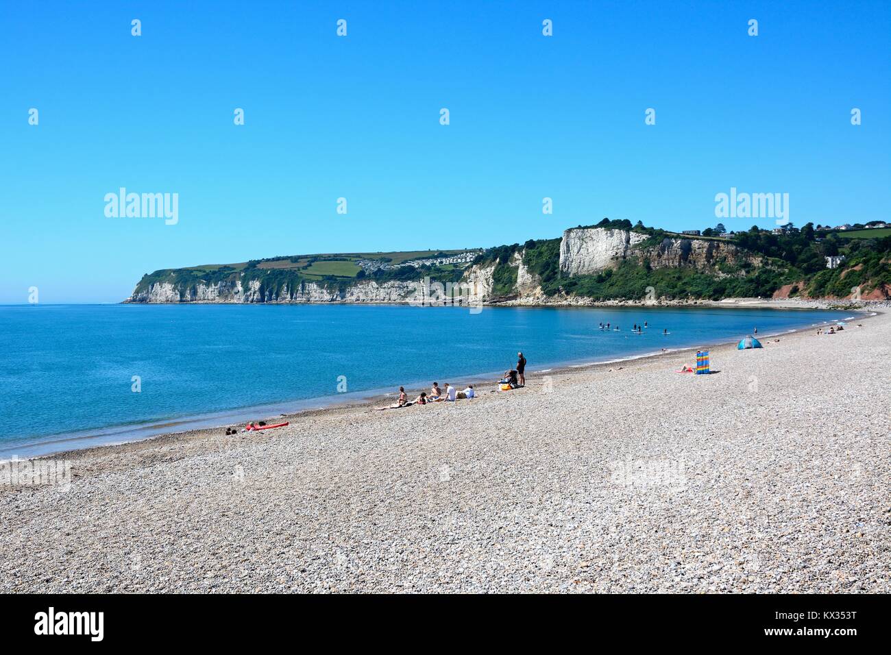 View of the pebble beach and coastline, Seaton, Devon, England, UK ...