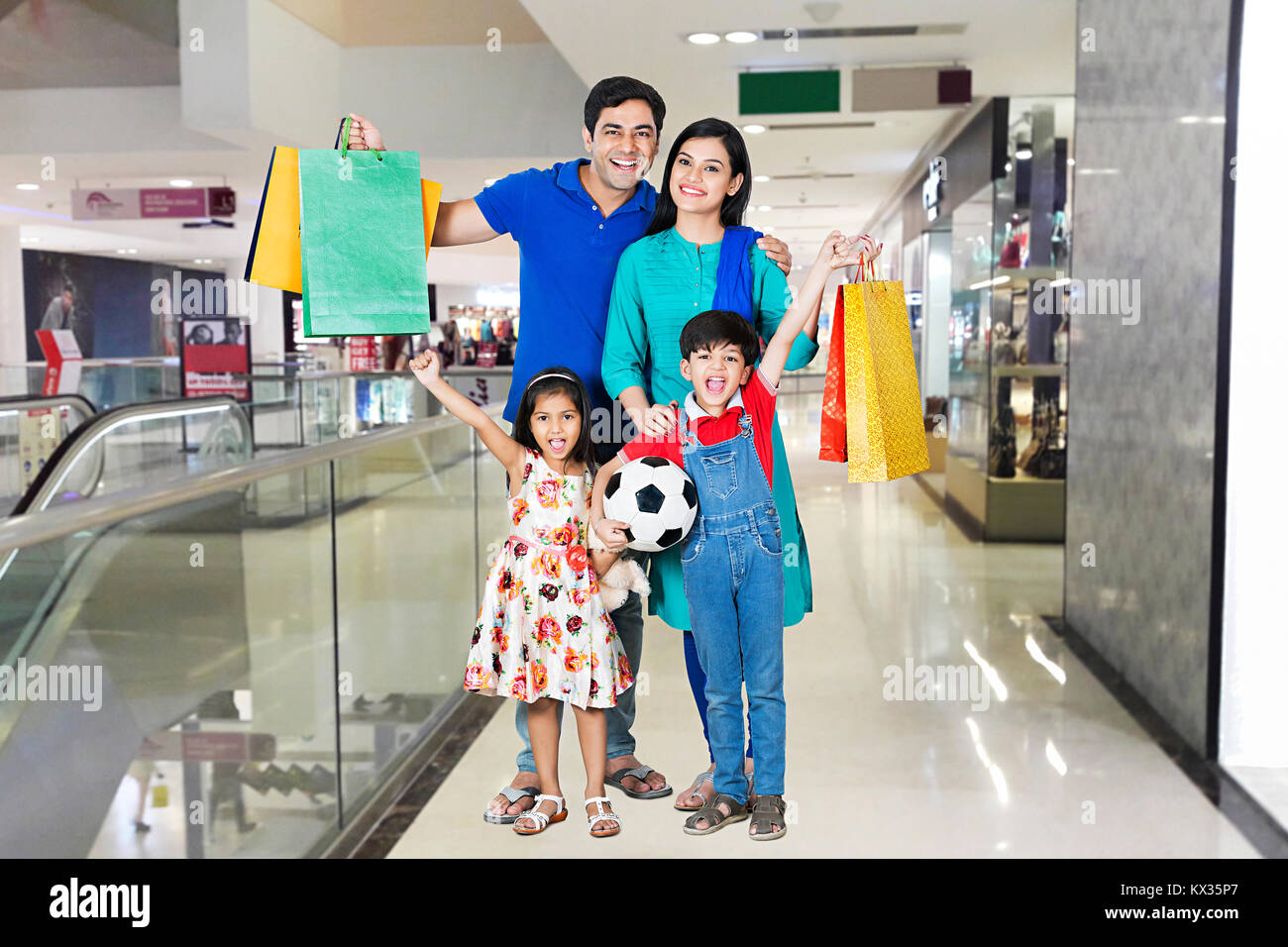 Family bags children kids parents retail hi-res stock photography and ...