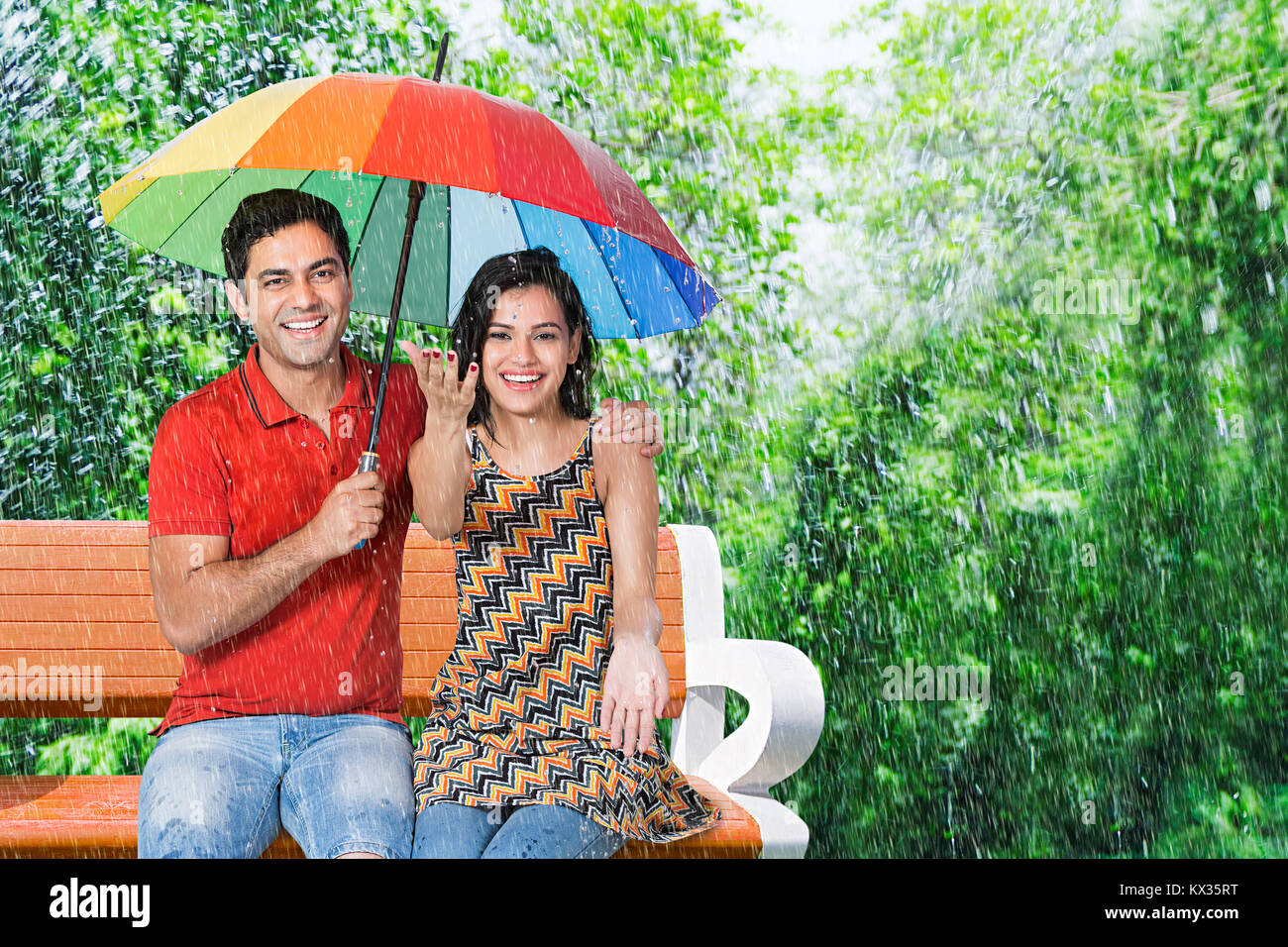 Couple Sitting Bench Under umbrella Falling Rain Hand touching ...