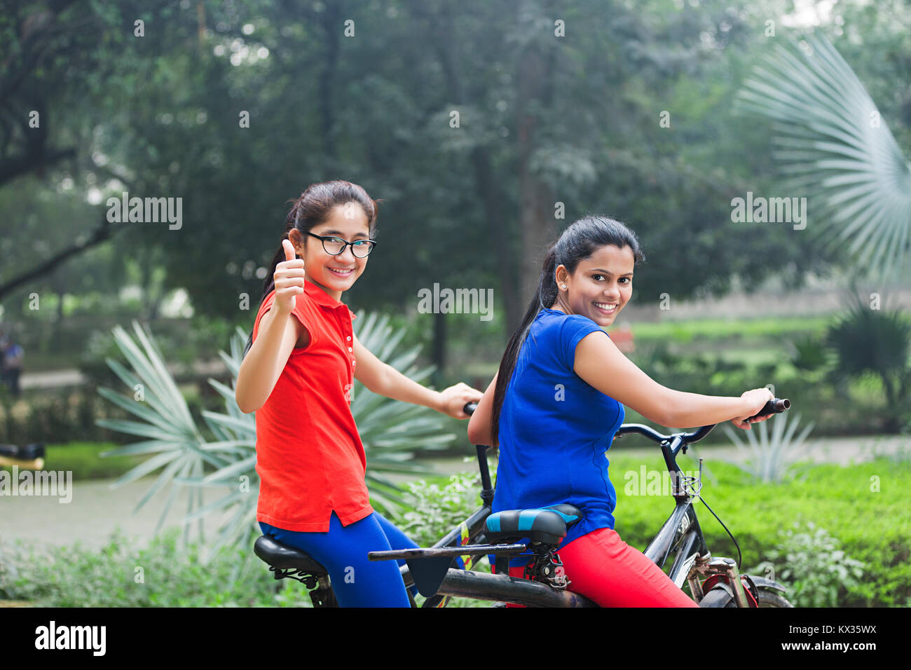 Indian girls cycling hi-res stock photography and images - Alamy