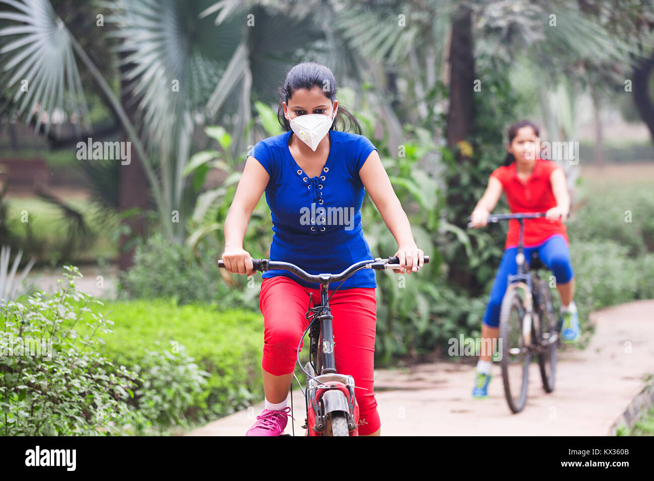 Young Woman Riding Cycle Park Stock Photo - Alamy