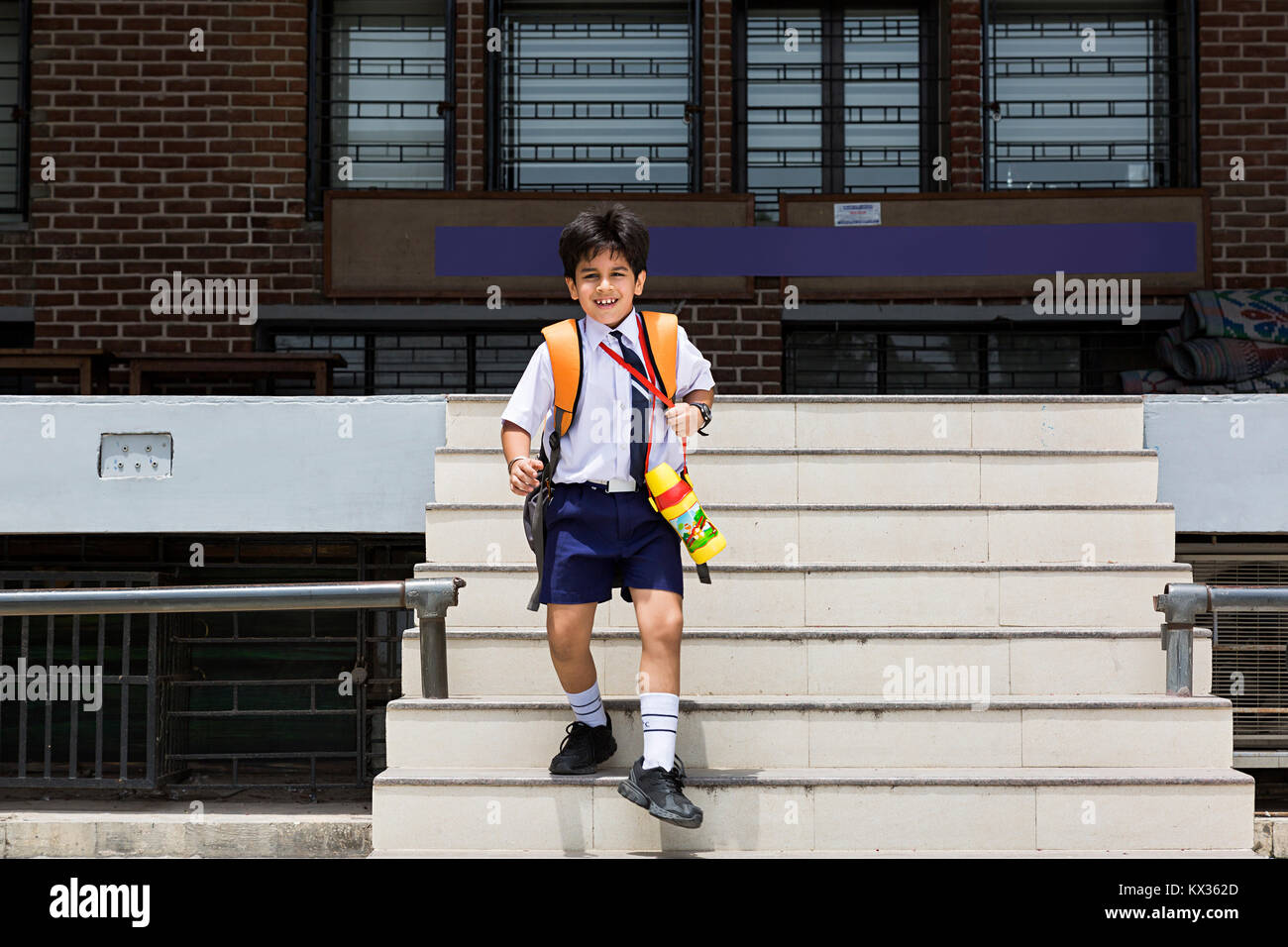 1 Indian School Kid Boy Student Running Stairs Moving-down Leaving ...