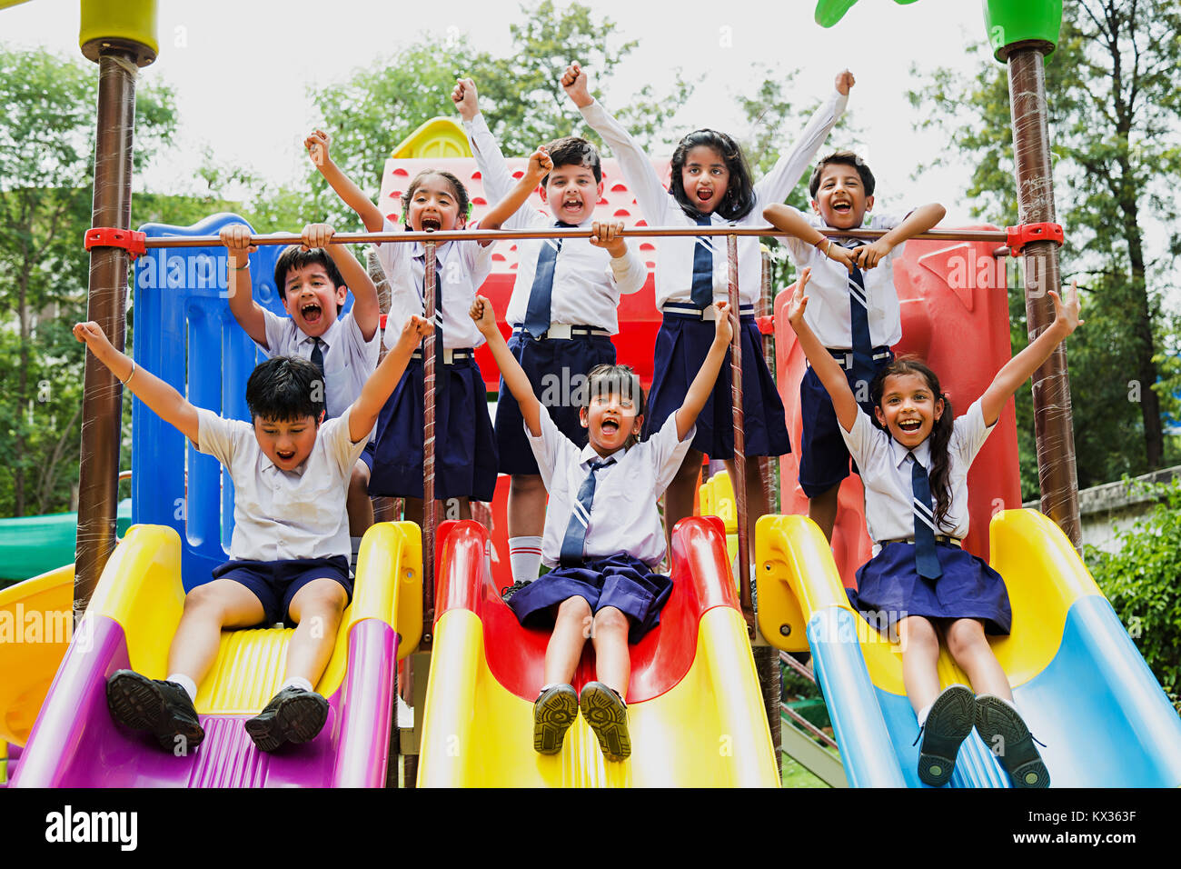Full length school uniform slide hi-res stock photography and images ...