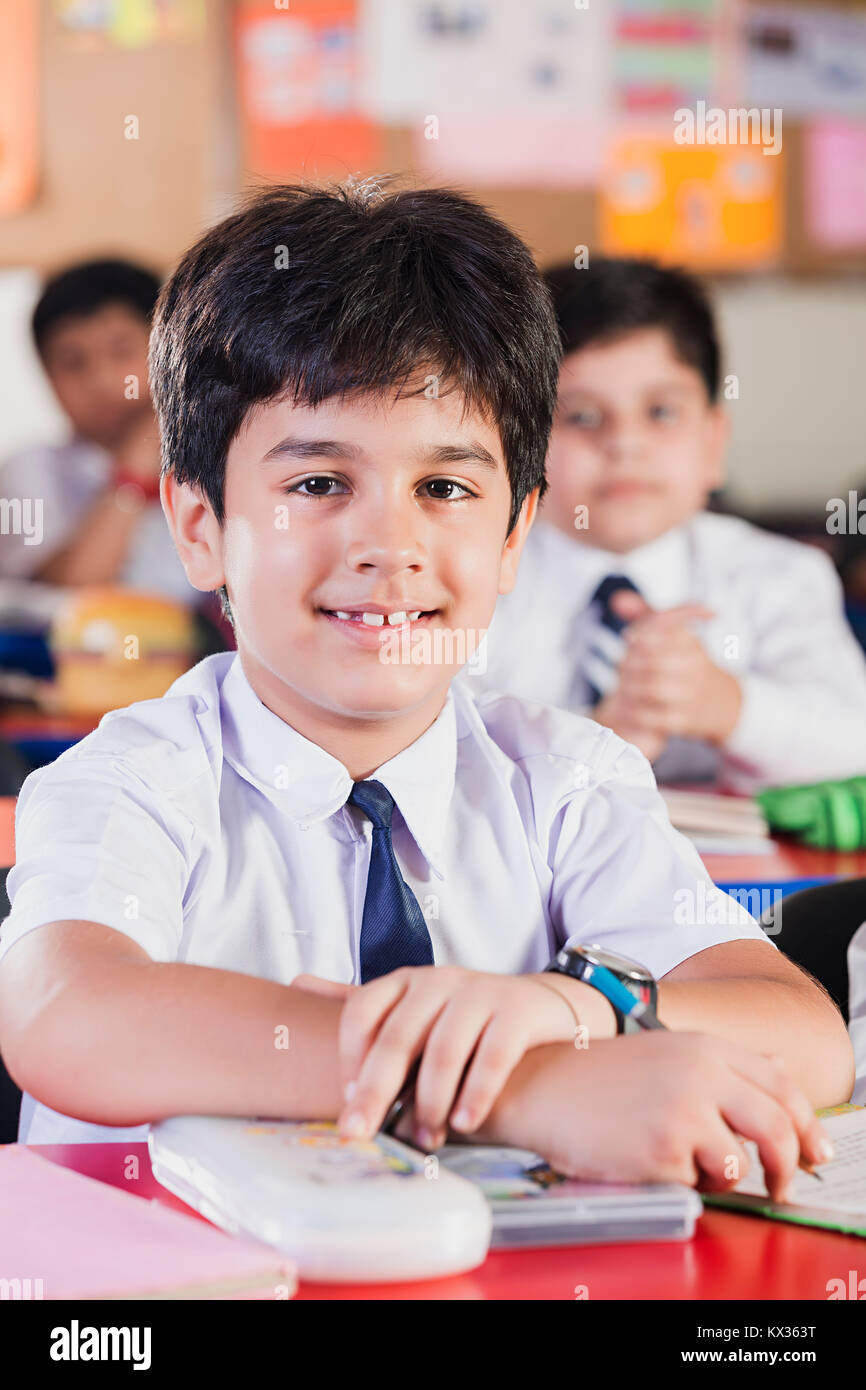 Indian School Little Boy Student Sitting In Classroom Stock Photo - Alamy