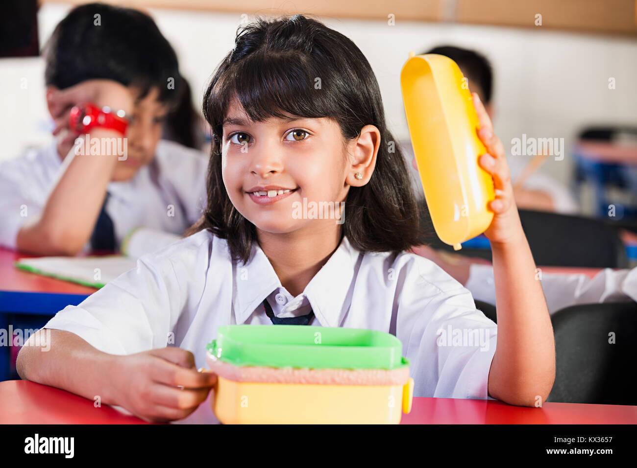 1 Indian School Girl Lunch Break Eating Lunch In Classroom Stock Photo ...