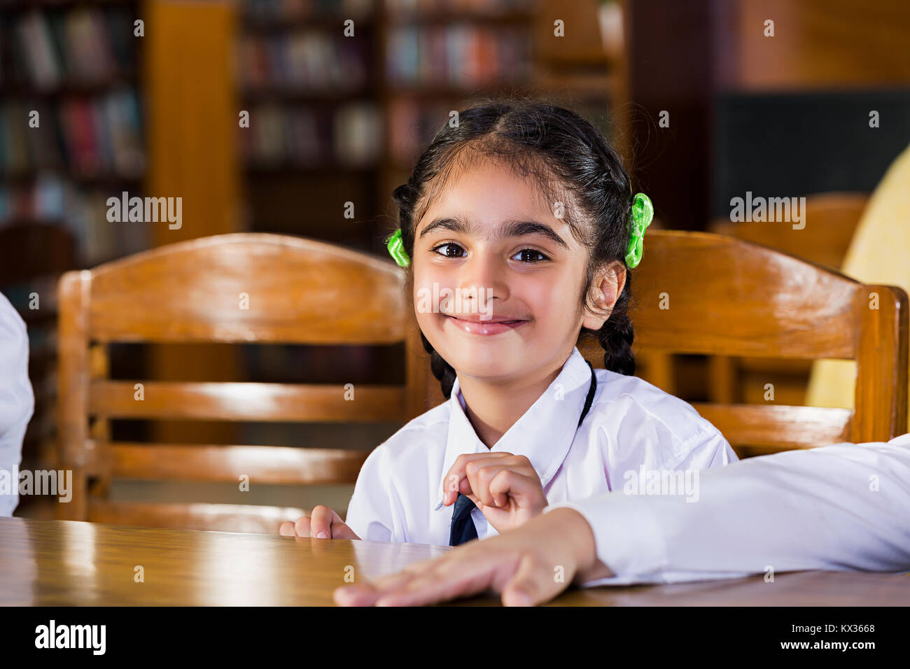 Girl at school library hi-res stock photography and images - Alamy