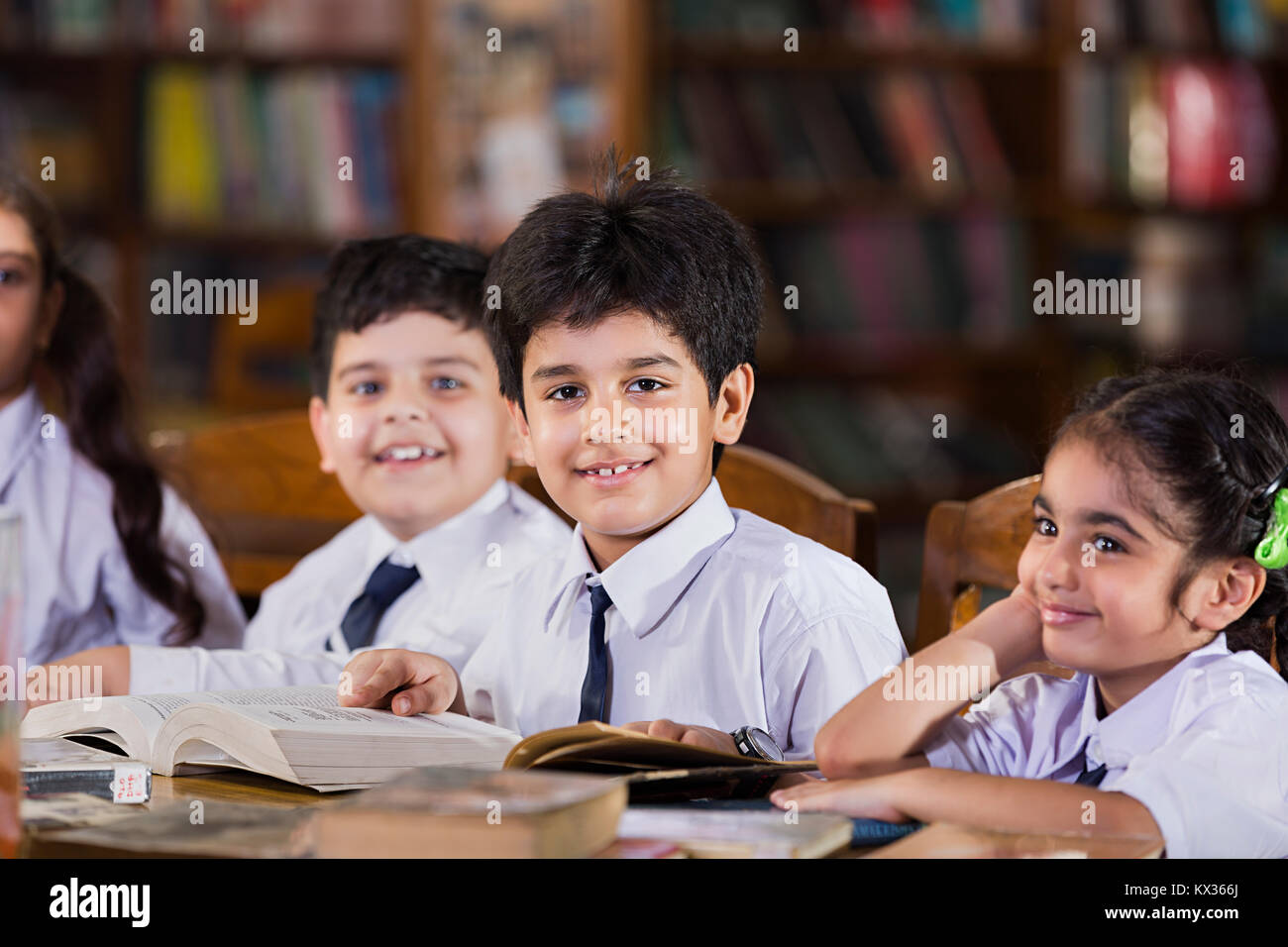 Indian School Kids Students Reading Book Study In Library Stock Photo ...