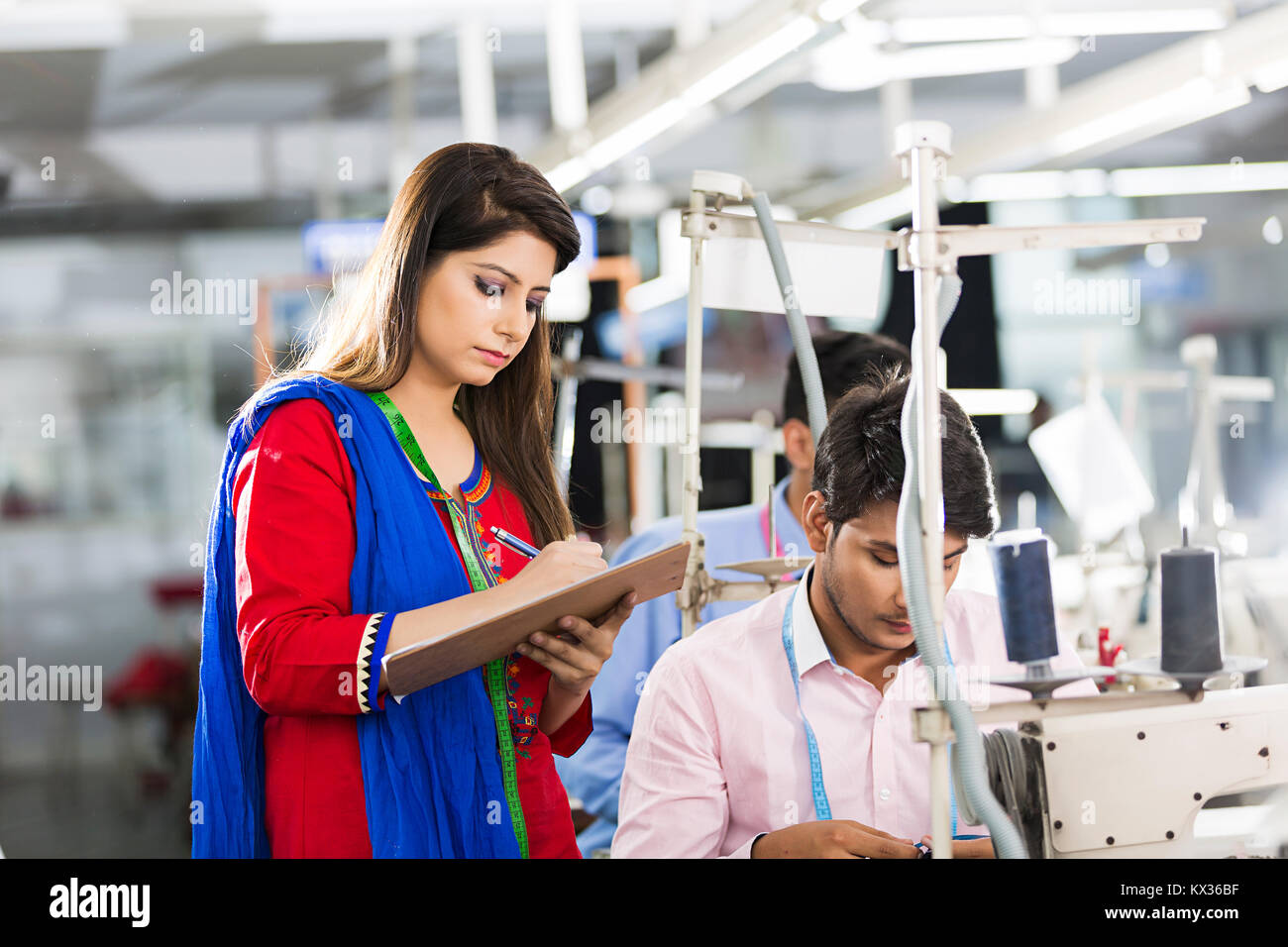 Indian people sewing clothes hi-res stock photography and images - Alamy