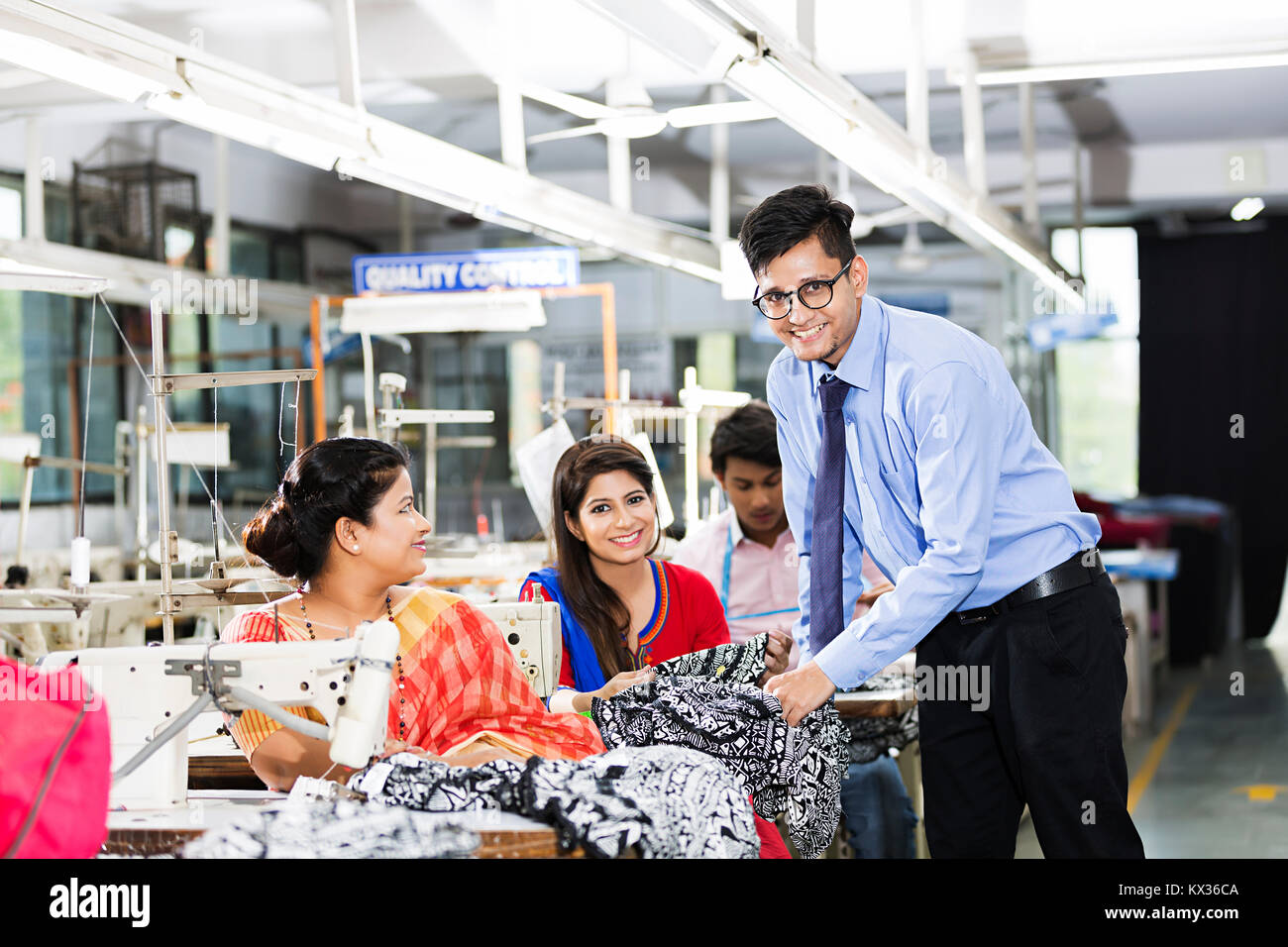 Sewing Manager Helping Workers Tailors Checking Clothes Factory Dress ...
