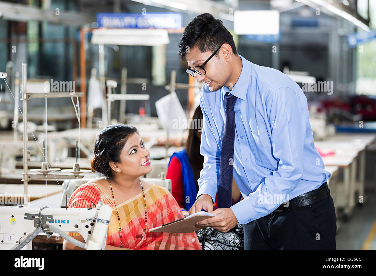 Workers Tailors Working Helping Manager Checking Clothes In Sewing ...