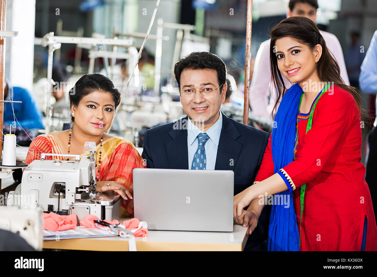 Workers Tailor s and Supervisor Using Laptop Discuss Planning Sewing ...